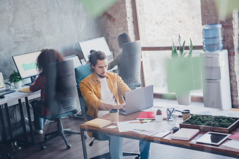 Modern Coworking Space with Diverse Professionals Collaborating on ...