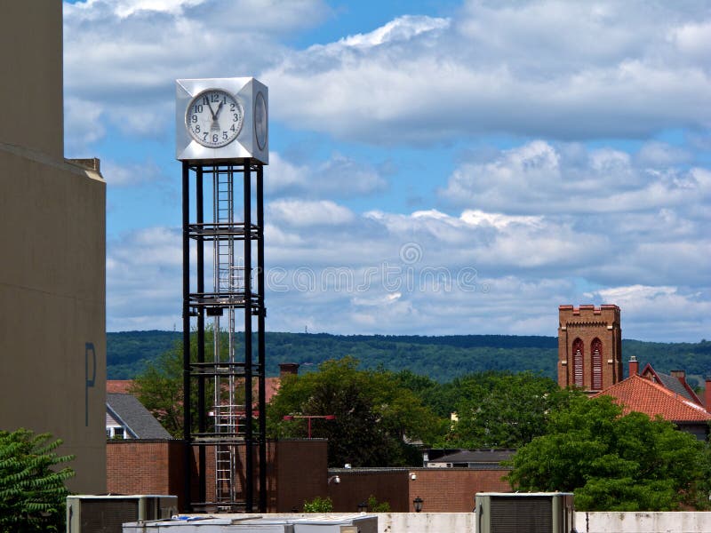 Modern Cube-Shaped Clock Tower In Mountain Setting Stock Photo - Image ...