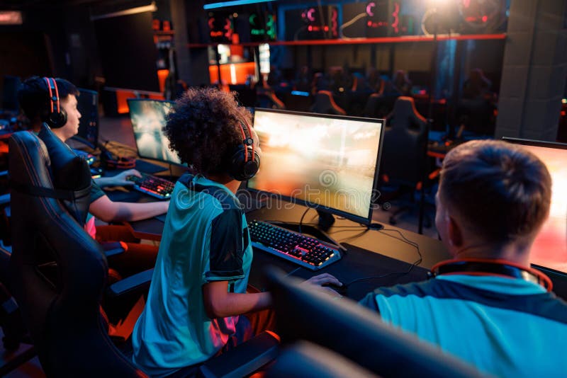 Esports Team Playing Online Game on Computers in Gaming Club Stock ...