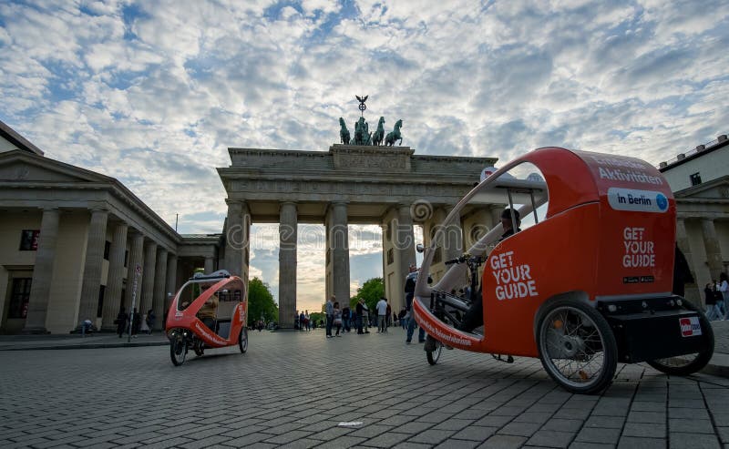 Modern Cycle Rickshaws Parked in Front of the Brandenburg Gate on a ...