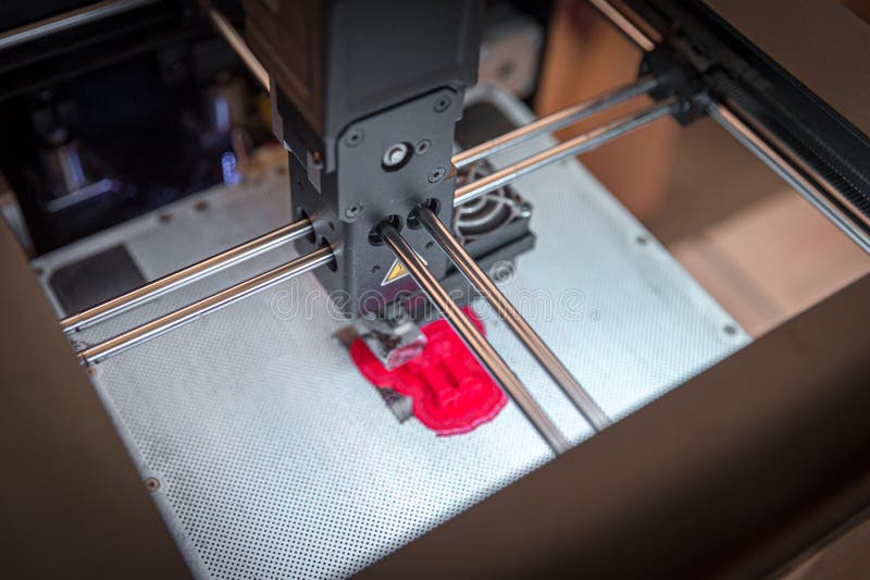 Modern 3D Printer Printing Small Red Figure, Closeup View from Above ...
