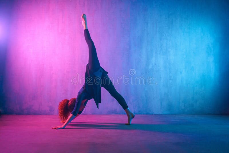 Modern Dance Girl Dancer Dancing in Neon Light Doing Gymnastic ...