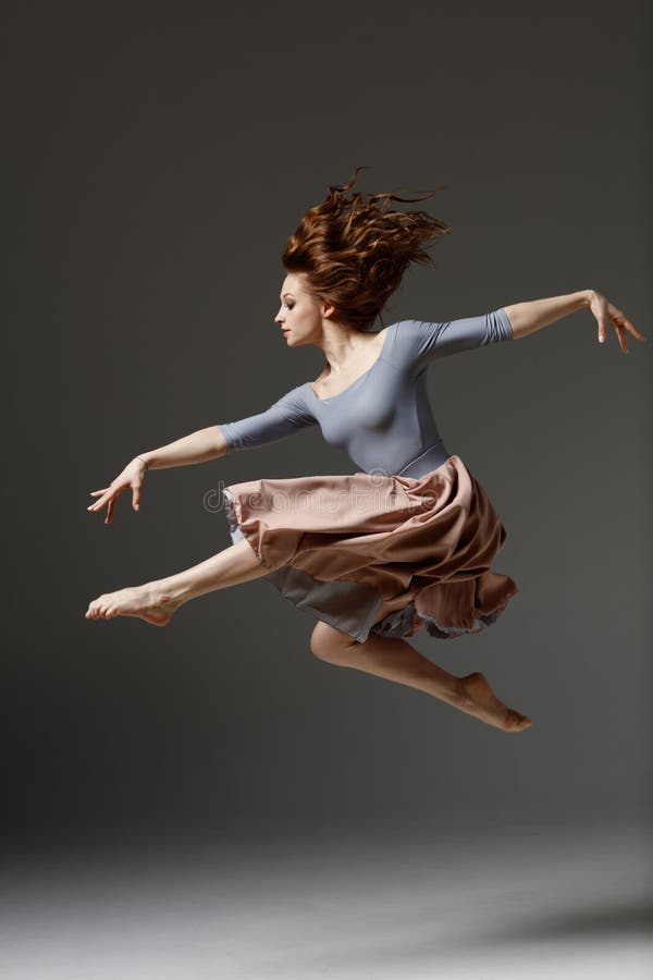 The Modern Dancer Jumping on a Gray Background Stock Image - Image of ...