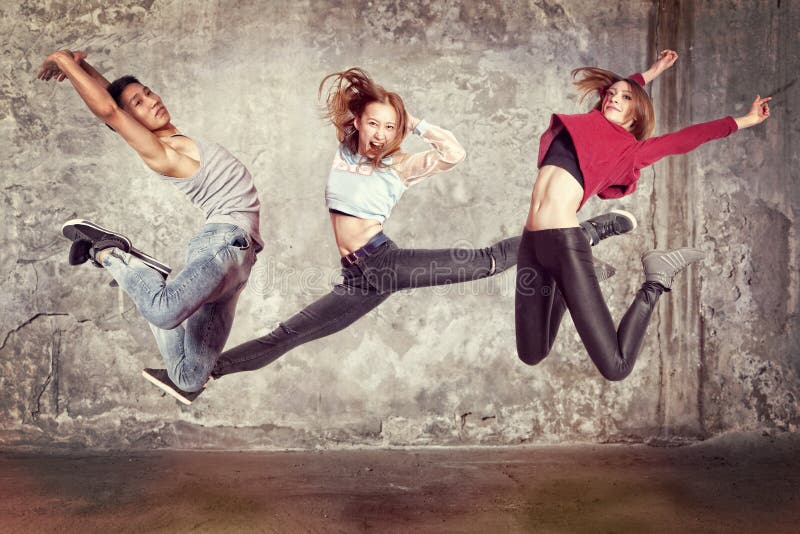 Modern Dancing Group Practice Dancing in Front Wall Stock Image - Image ...