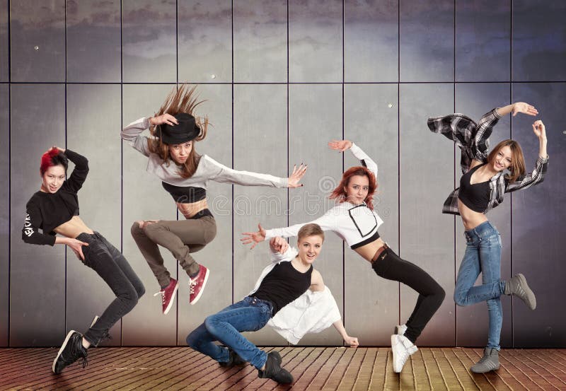 Modern Dancing Group Practice Dancing in Front Wall Stock Image - Image ...