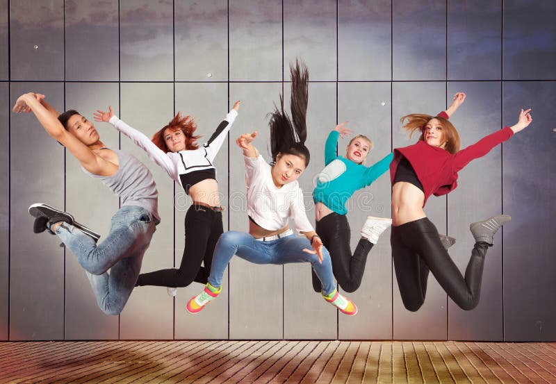Modern Dancing Group Practice Dancing in Front Wall Stock Photo - Image ...