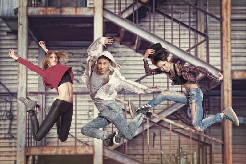 Modern Dancing Group Practice Dancing in Front Wall Stock Photo - Image ...