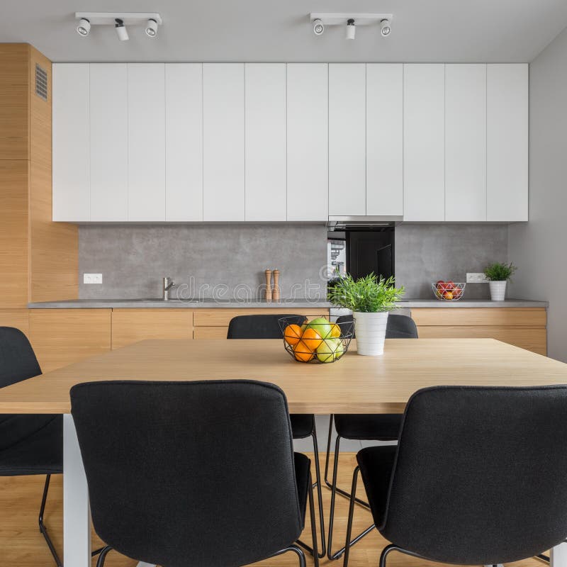 Modern Kitchen with Long Dining Table Stock Image - Image of ...