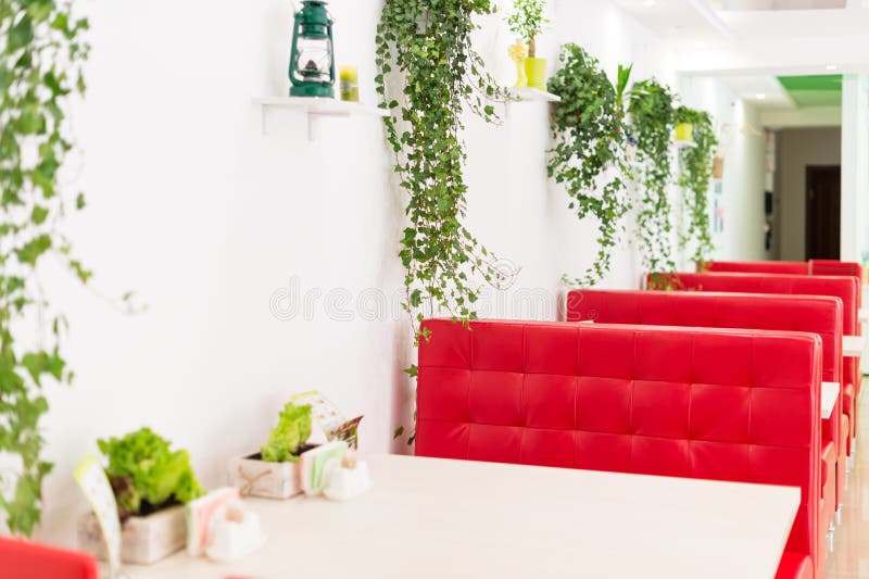 Modern Design Restaurant Interior in White and Red Colors with Plants ...