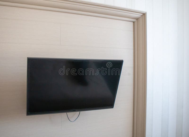 Modern Design of a Room with a Black Plasma LED TV on the Wall, a Mock ...