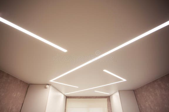 Modern Designer Stretch Ceiling with Illuminated LED Lines in the Room ...