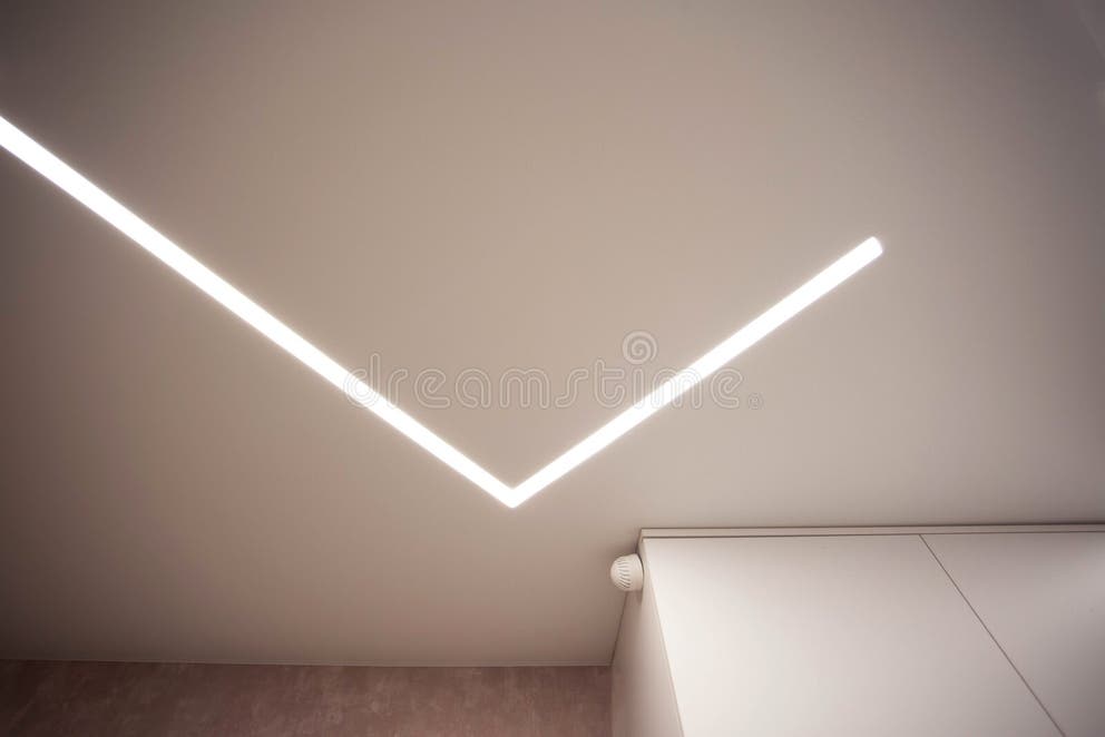 Modern Designer Stretch Ceiling with Illuminated LED Lines in the Room ...
