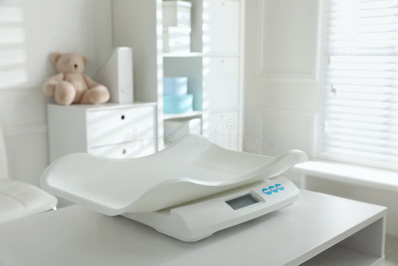 Modern Digital Baby Scales on Table in Clinic Stock Photo - Image of ...
