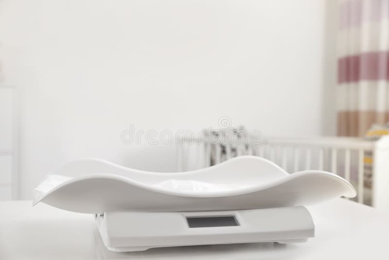 Modern Digital Baby Scales on Table in Room Stock Image - Image of ...