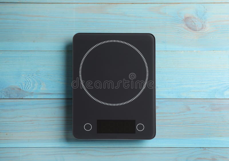 Modern Digital Kitchen Scale on Light Blue Wooden Table, Top View Stock ...