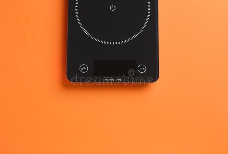 Modern Digital Kitchen Scale on Orange Background, Top View. Space for ...