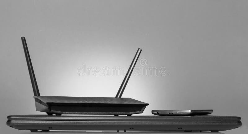 Modern Digital Technology-modem, Computer, Phone, on Grey Stock Image ...