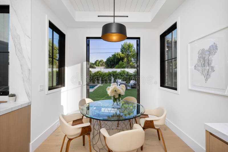 Modern Dining Area with a View of the Backyard. Stock Photo - Image of ...
