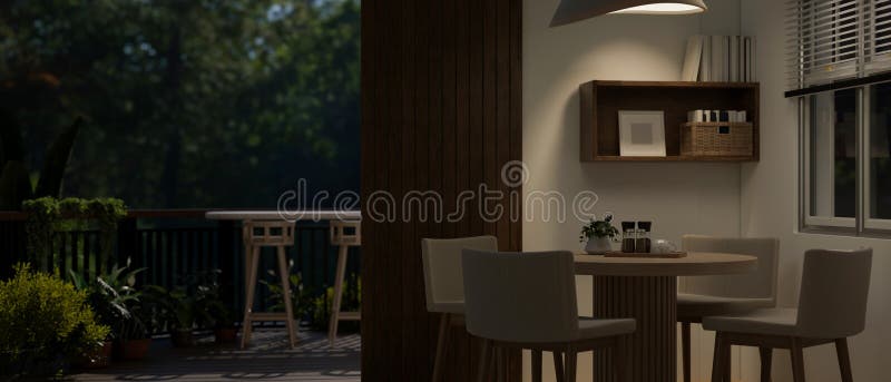 A Modern Dining Room with a Balcony with a Beautiful Nature View at ...