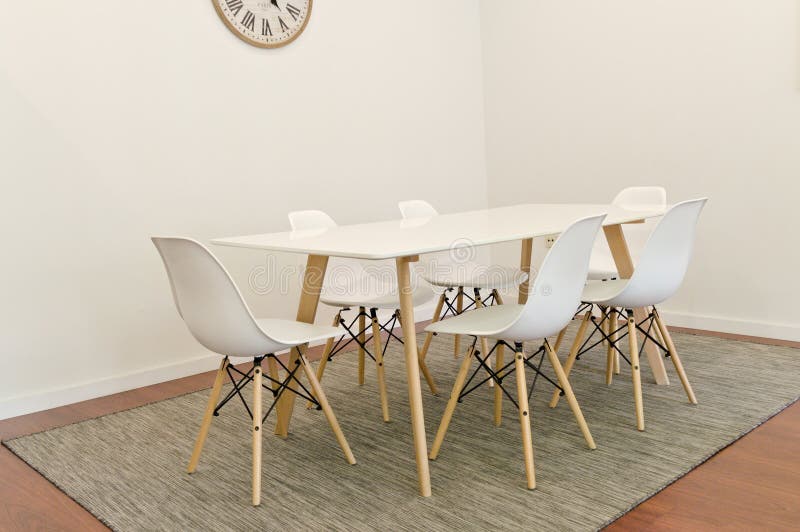 Modern Dining Table with Six White Chairs in Minimalist Room, Clean ...