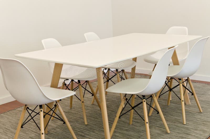 Modern Dining Table with Six White Chairs in Minimalist Room, Clean ...