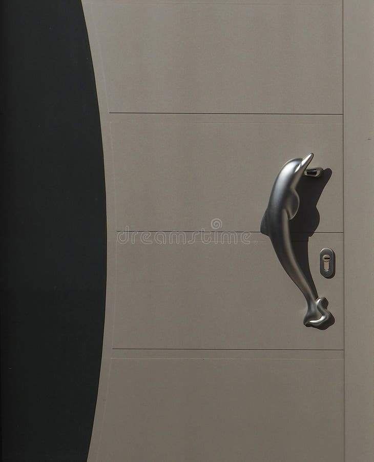 Modern Door Handle Depicting a Dolphin Stock Image - Image of depicting ...