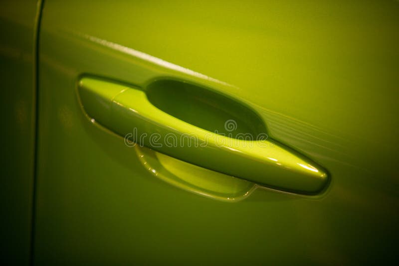Modern Door Handle of a Green Car Stock Image - Image of macro ...