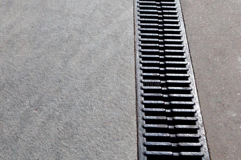 Modern Drainage System the Drain on the Road or the Sidewalk. Stock ...