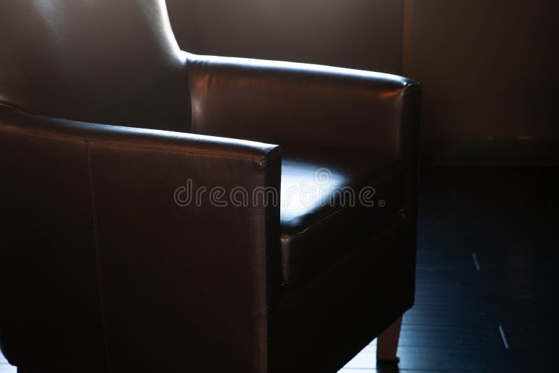 Dramatic Dark Lighting on Comfortable Office Chair Stock Image - Image ...