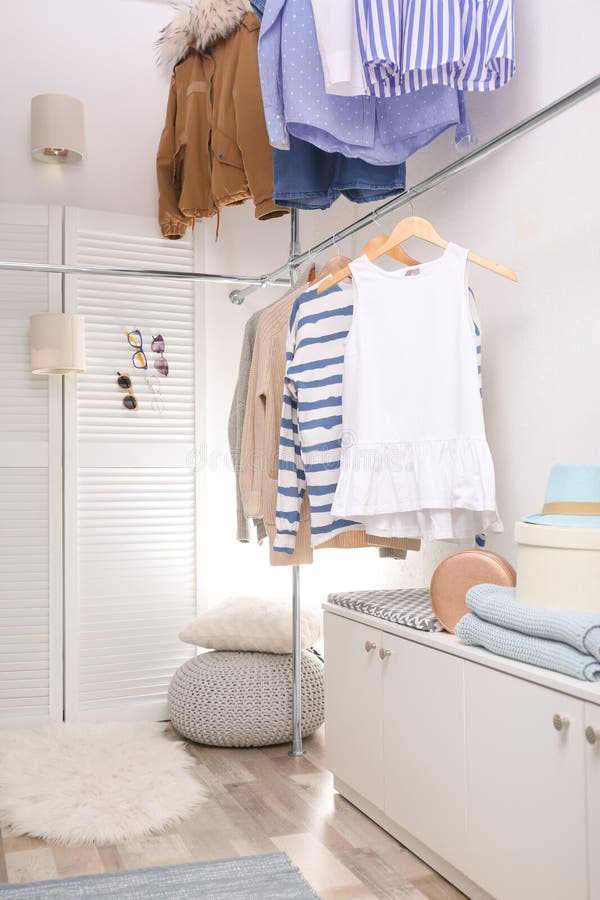 Modern Dressing Room with Different Stylish Clothes Stock Photo - Image ...