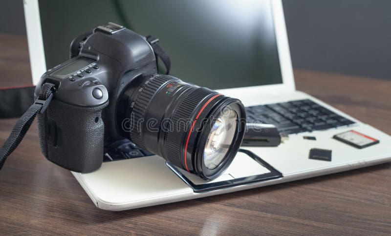 Modern DSLR Camera and Laptop Computer Stock Image - Image of camera ...