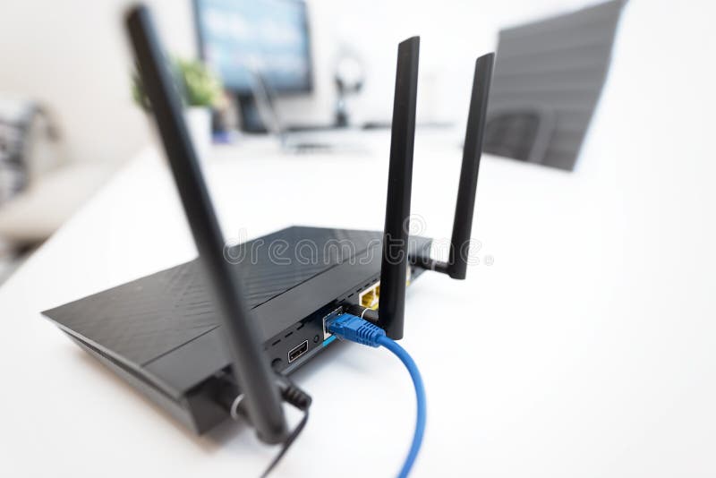 Modern Wi-fi Router on Light Table in Room Stock Photo - Image of ...