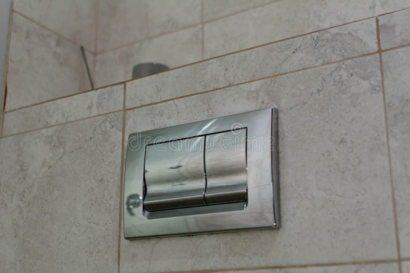 Modern Dual Button for Flushing in the Hotel Bathroom. Selective Focus ...