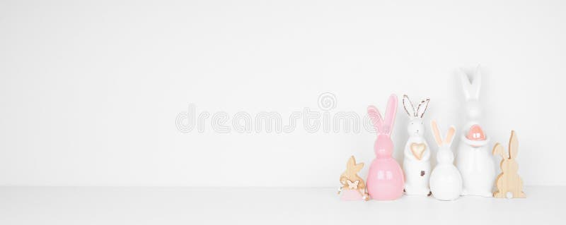 Modern Easter Bunny Decor on a White Shelf Against a White Wall Banner ...