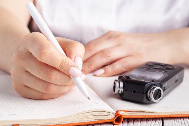 Modern Education Concept, Recording Lecture on Voice Recorder instead ...