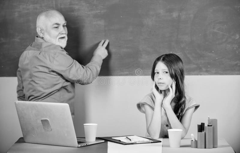 Modern Education. Tired Student. Senior Teacher and Girl School Lesson ...