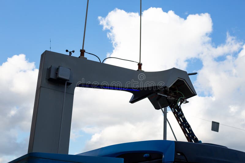 Modern Electric Bus Charging Station with Raised Connector, Powered by ...