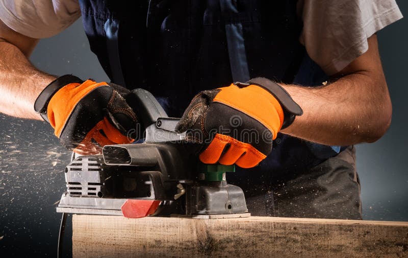 Modern Electric Chain Saw in the Workshop Stock Image - Image of metal ...