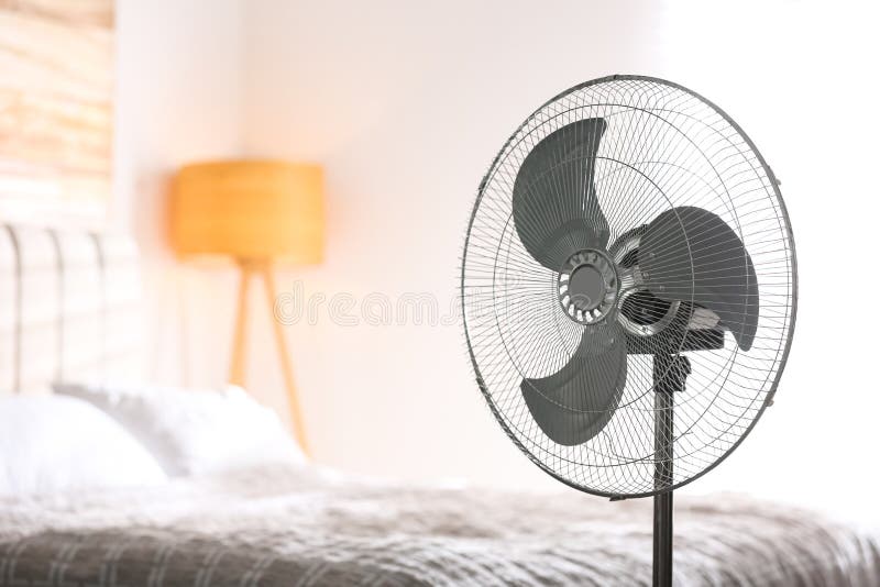 Modern Electric Fan in Bedroom. Space for Text Stock Image - Image of ...