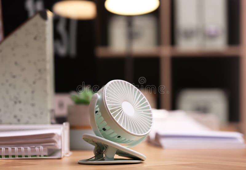 Modern Electric Fan on Table in Office Stock Photo - Image of cool ...