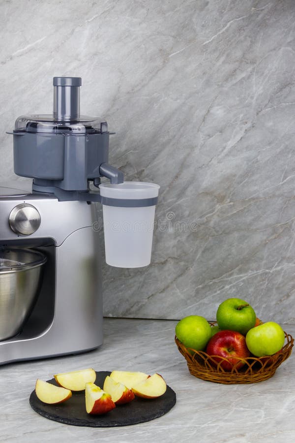 Modern Electric Juicer and Apples on Kitchen Table Stock Photo - Image ...