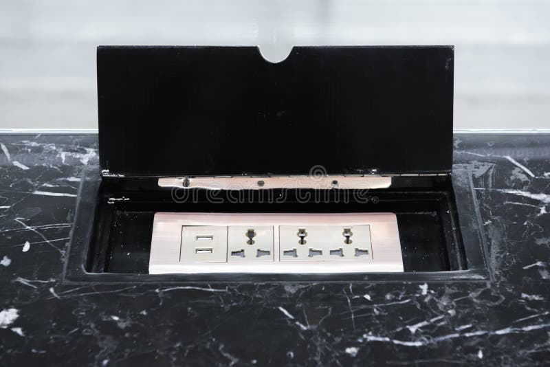 Modern Electric Plugs Built in Table. Stock Image - Image of device ...