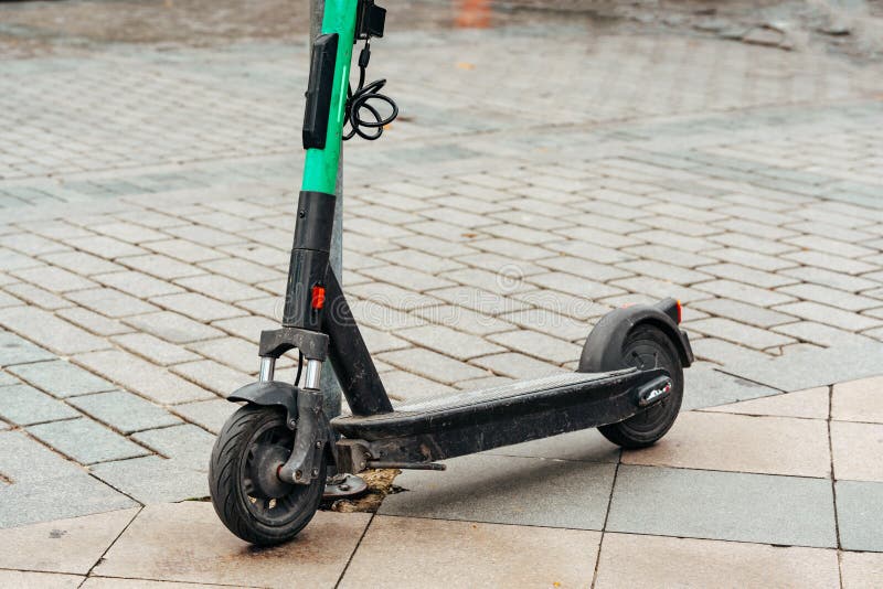 Modern Electric Scooter Parked on the Street Stock Photo - Image of ...