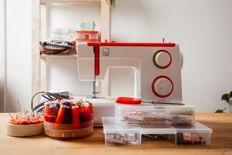 Modern Sewing Machine with Variety of Threads in Box Stock Photo ...