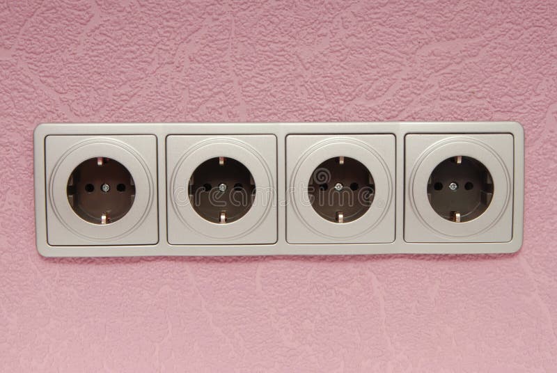 Modern Electric Socket in Interior, Grey Wall Outlet on Pink Wall Stock ...