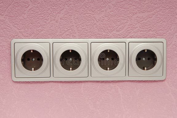 Modern Electric Socket in Interior, Grey Wall Outlet on Pink Wall Stock ...