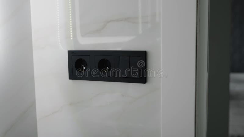 Modern Electric Socket and Switch on White Marble Wall Stock Video ...