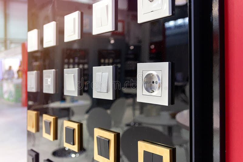 Modern Electrical Household Switches and Sockets on the Stand in the ...