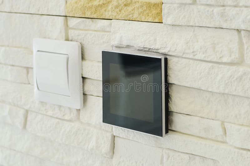 Modern Electrical Switch on the Wall with Decorative Plaster, Close-up ...