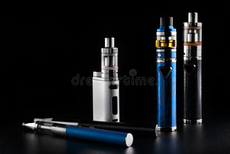 Electronic Cigarettes or Vaping Devices on Black Background Stock Image ...